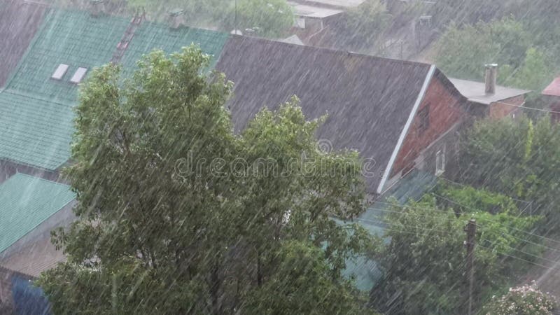 Very Heavy Rain, Drops Falling on Roofs of Houses. Stock Footage ...