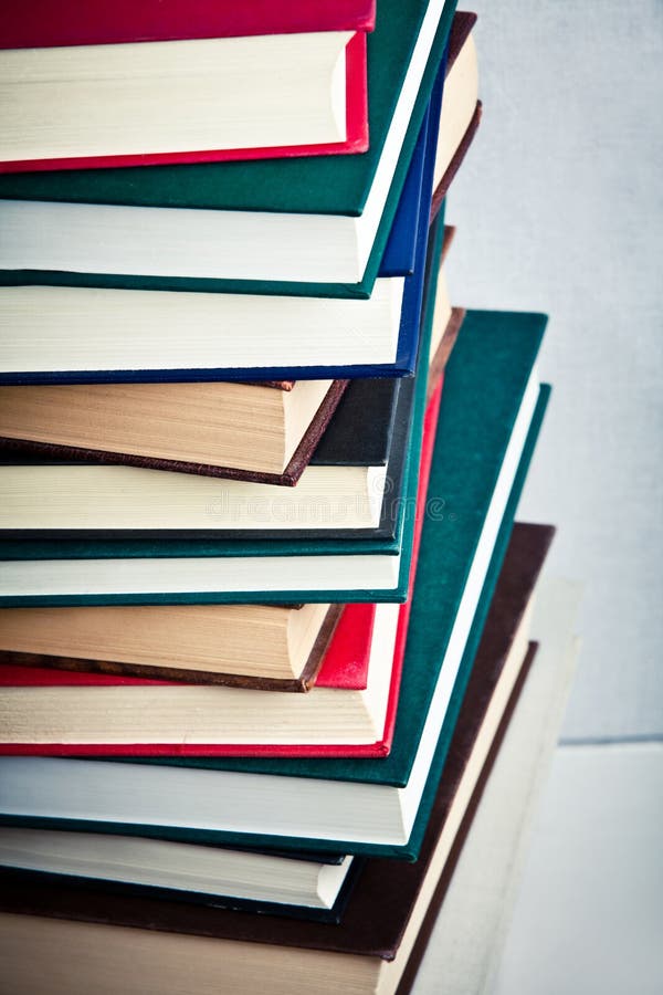 Very High Stack of Books on a Table Stock Photo - Image of background ...