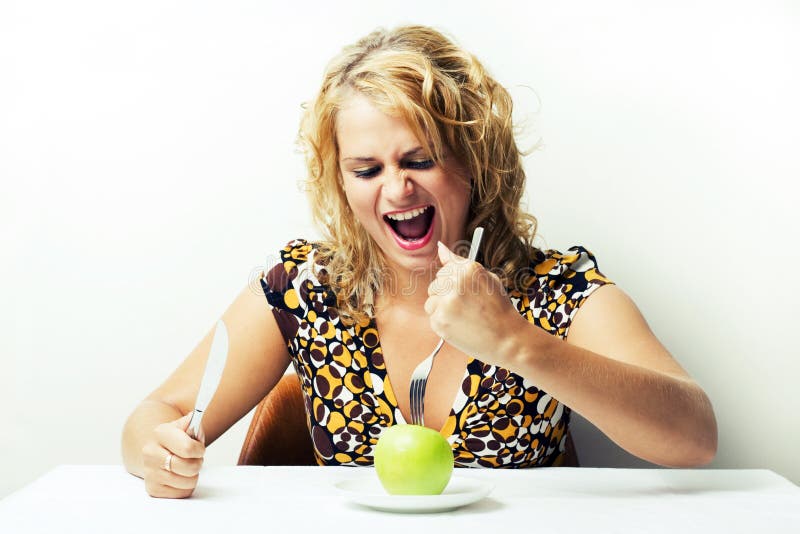 Very hungry girl. stock photo. Image of knife, apple, snack - 5920608