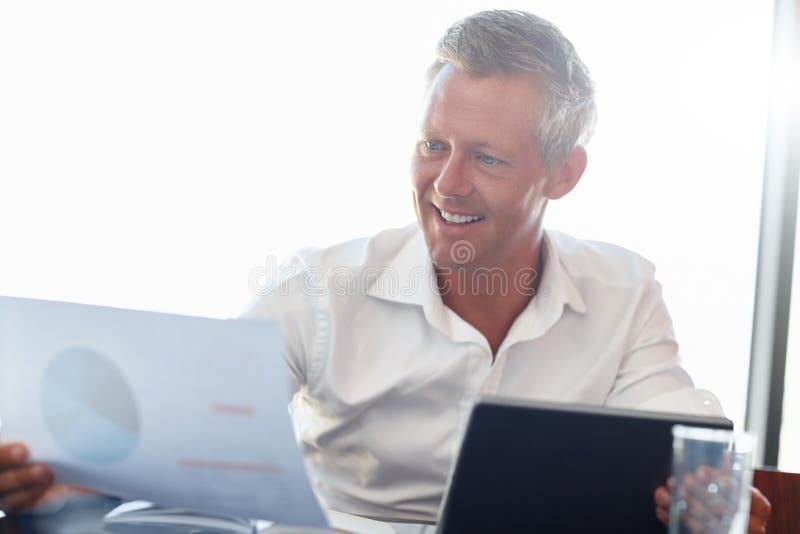 Very Impressive. a Handsome Businessman in the Office. Stock Photo ...