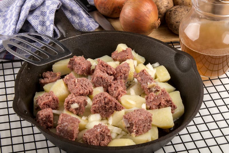 Raw Corned Beef Hash in a Cast Iron Pan Stock Image - Image of corned ...