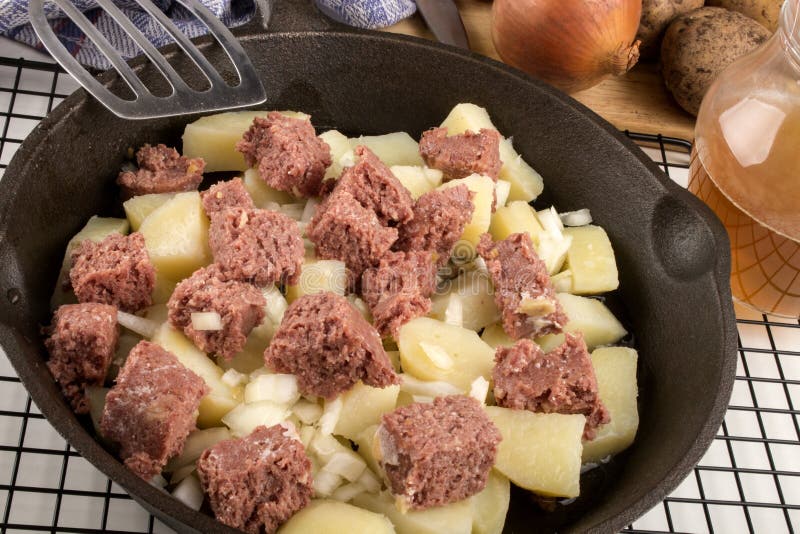 Raw Corned Beef Hash in a Cast Iron Pan Stock Image - Image of ...