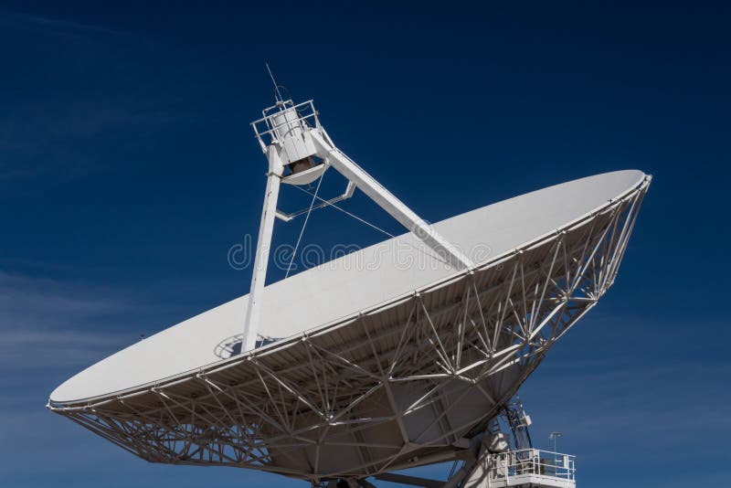 Very Large Array Close View of a Radio Antenna Dish Against a Deep Blue ...