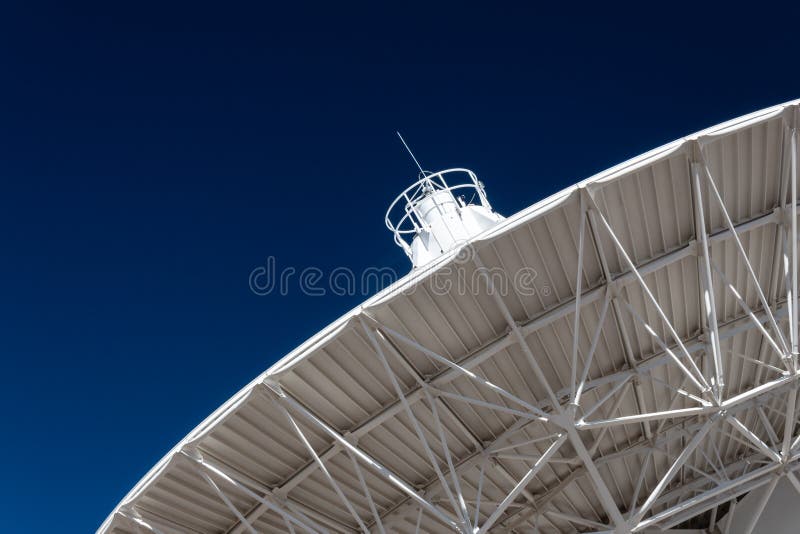 Very Large Array Radio Telescope Dish Pointing into a Deep Blue Sky ...