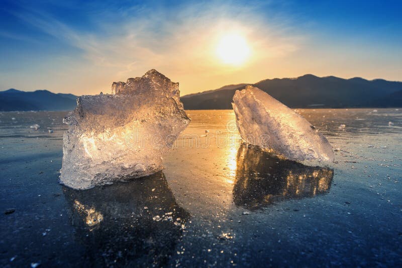 Very Large and Beautiful Chunk of Ice at Sunrise in Winter Stock Photo ...