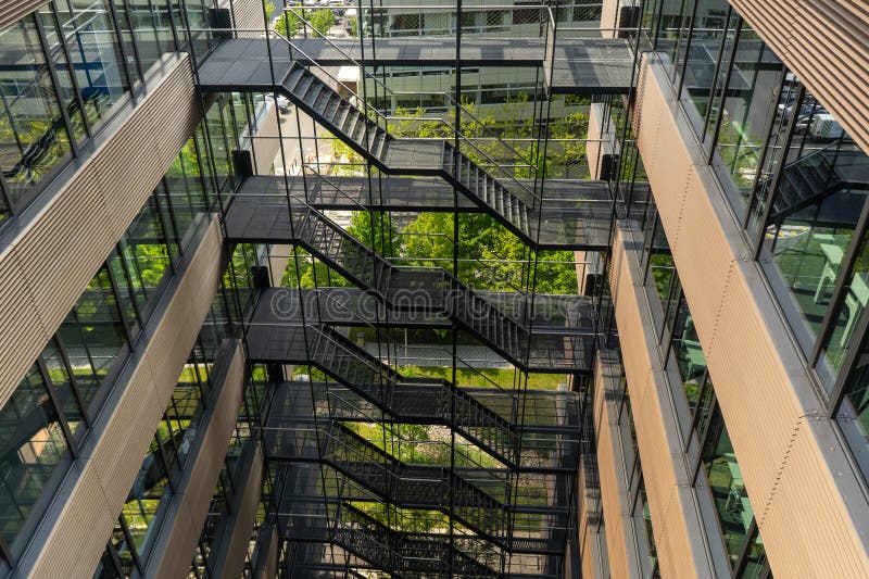A Very Large Building with Numerous Stairs Going Both Up and Down Stock ...