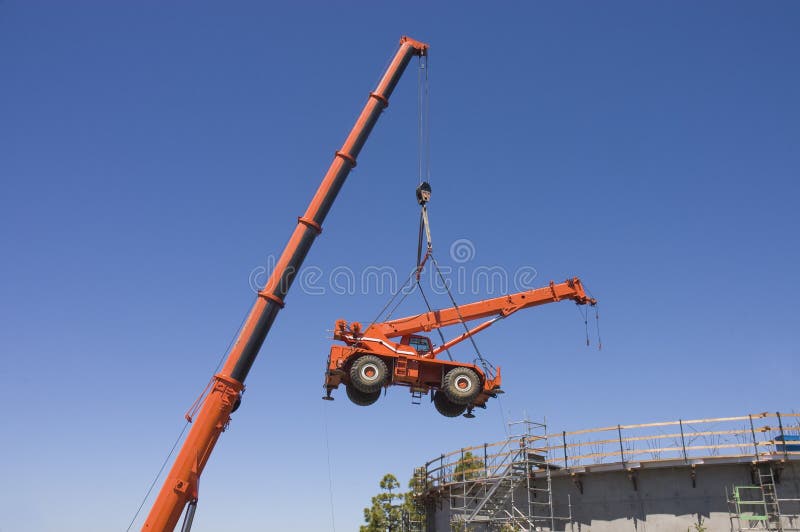Very Large Crane Lifting Small Crane Stock Image - Image of heavy ...