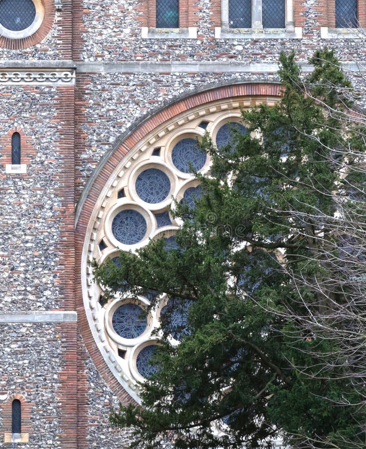 Very Large Round Window in a Cathedral, Green Tree in Front of it Stock ...