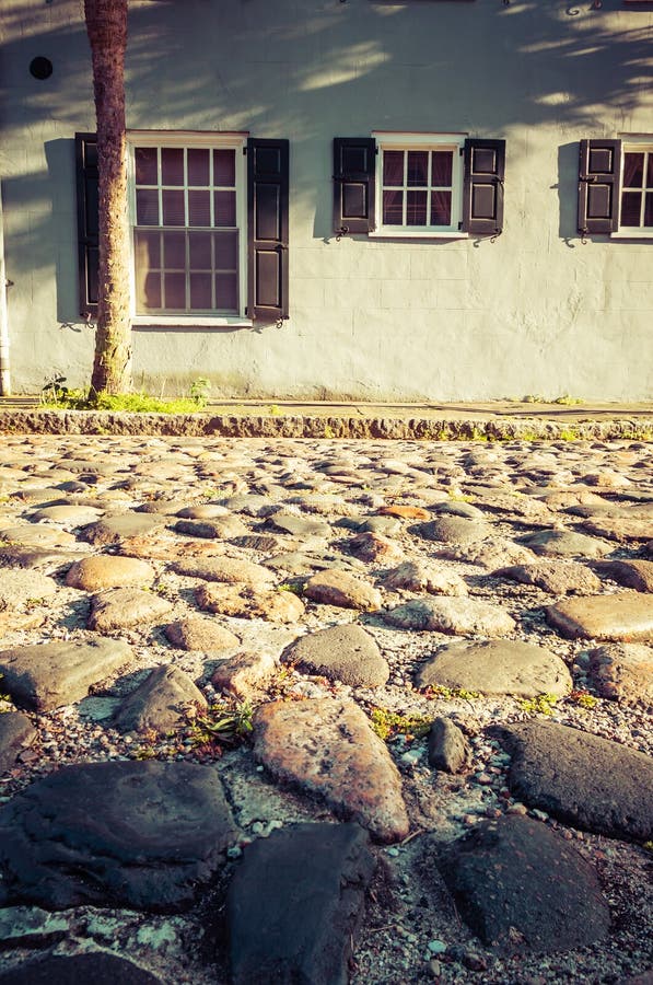 A Very Low Angle Photo on a Cobblestone Street Facing a Home Stock ...
