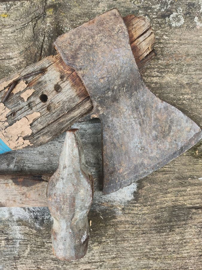 Very old axe and hammer. stock image. Image of wood - 231078187