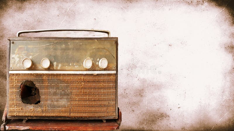 A Very Old, Damaged Radio Player with an Old Picture Background Stock ...