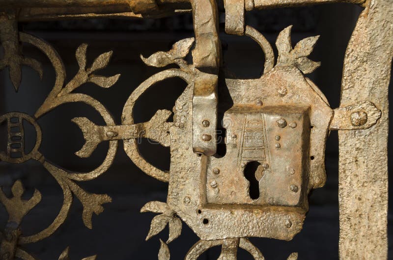 Very Old Handmade Brass Lock on a Patterned Lattice Stock Image - Image ...