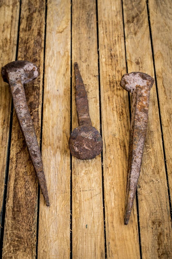 Very Old Large Nails on a Beautiful Wooden Background, Rusty Stock ...