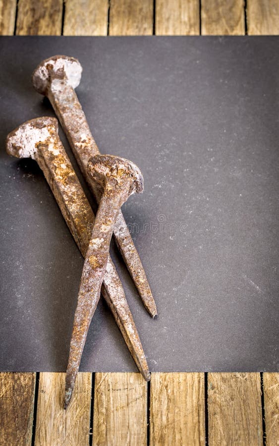 Very Old Large Nails on a Beautiful Wooden Background, Rusty Stock ...
