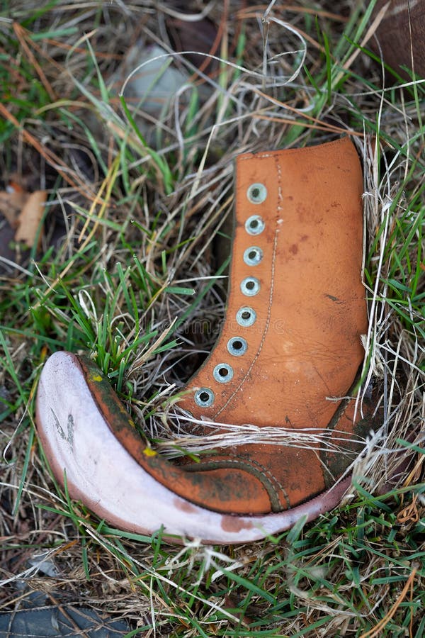 Very Old Leather Boot Lying on the Ground Stock Photo - Image of ...