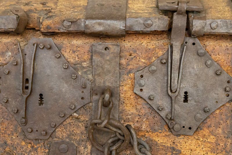 Old lock on a wooden chest stock photo. Image of iron - 231446846