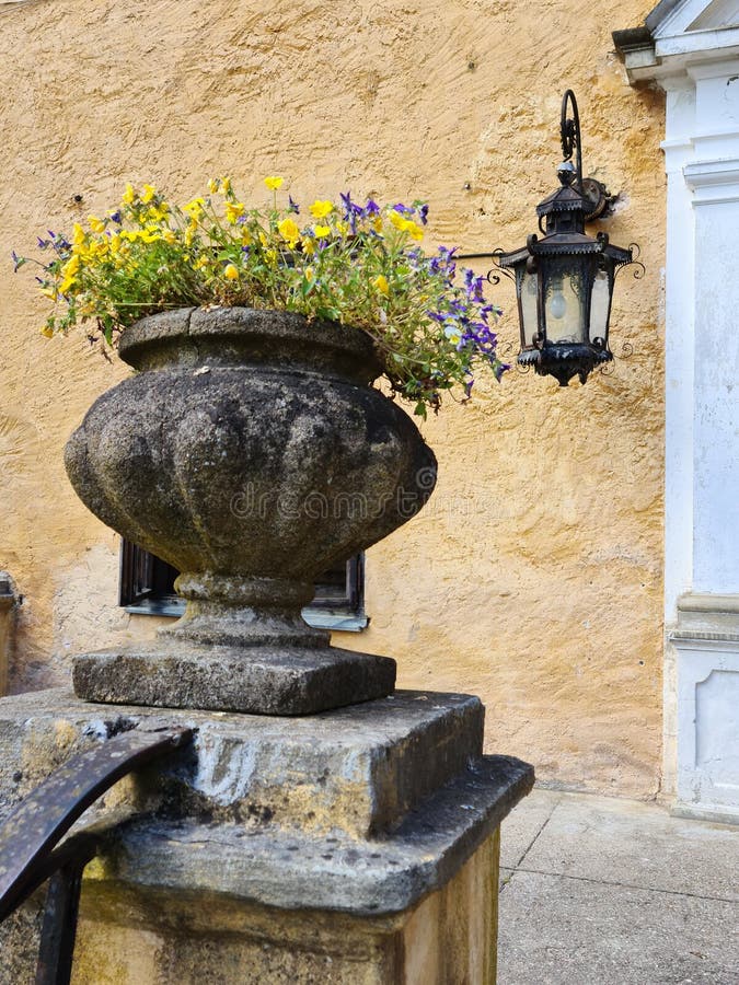 Very Old Outdoor Lamp on a Yellow Wall during Daylight Hours Stock ...