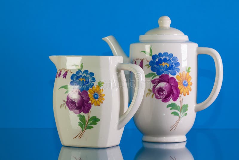 Very Old Porcelain Tea Set on Blue Reflection Background Stock Photo ...
