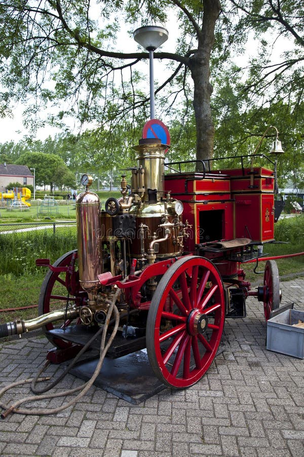 Very Old Red Fire Engine on Street Stock Photo - Image of department ...
