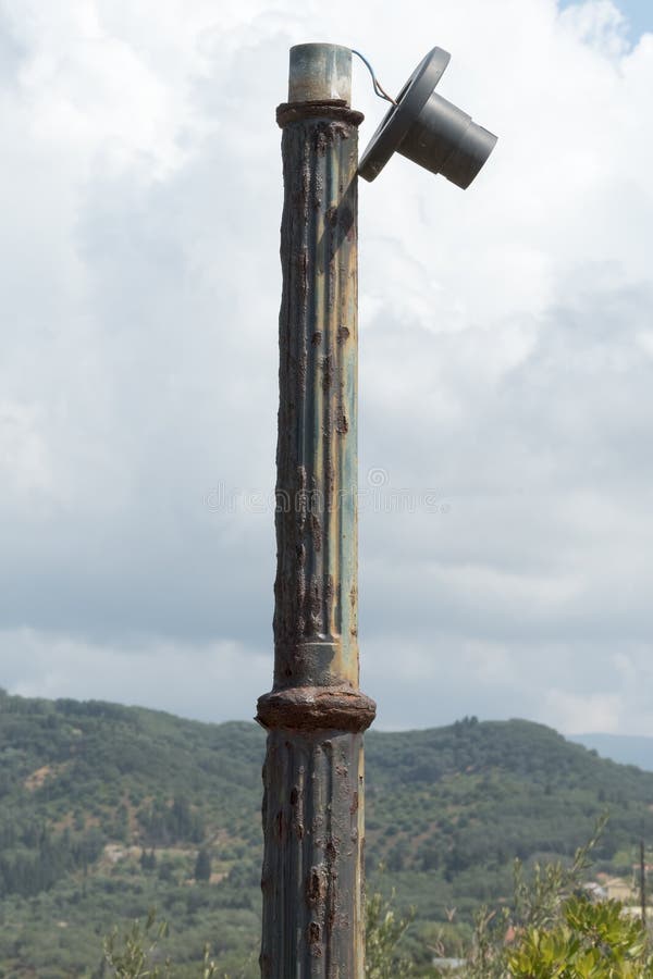 A Very Old Rusting Lamp Post on a Cliff Pathway in Agios Stefanos Corfu ...