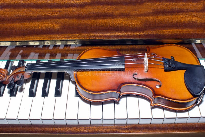 Very Old Violin Lying on the Piano Stock Image - Image of ebony, cello ...