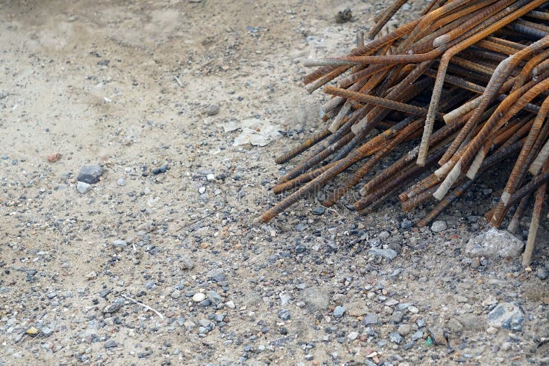 A Very Rust Lot of Iron Rods on the Ground in the Construction Site ...