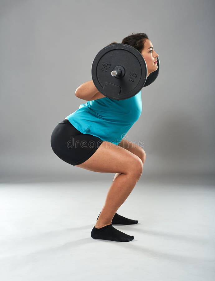 Strong Latino Woman Doing Squats with Barbell Stock Image - Image of ...