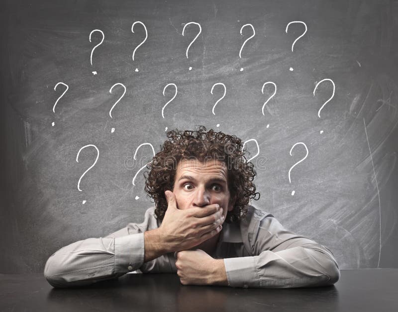 Surprised Funny Looking Scared Business Man with Many Question Marks ...