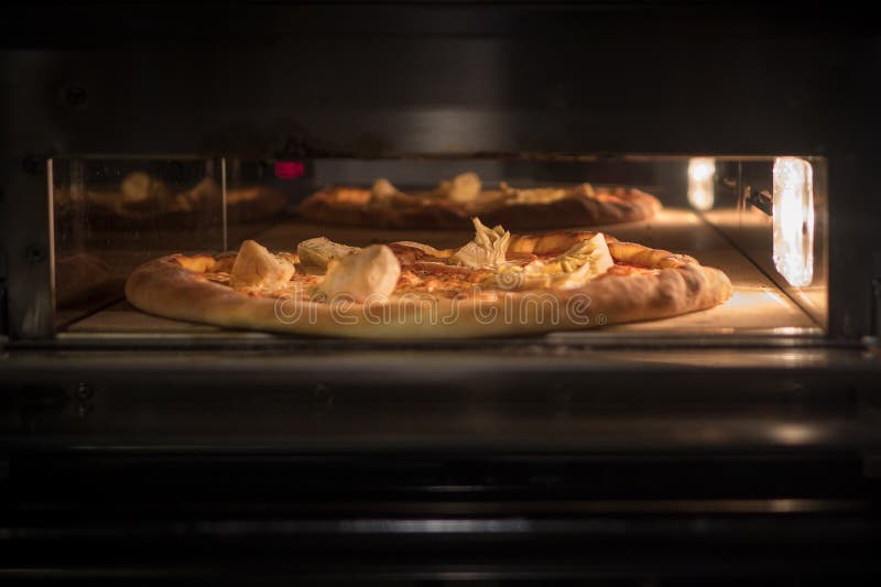 Very tasty pizza in a cafe stock image. Image of dinner - 104446417