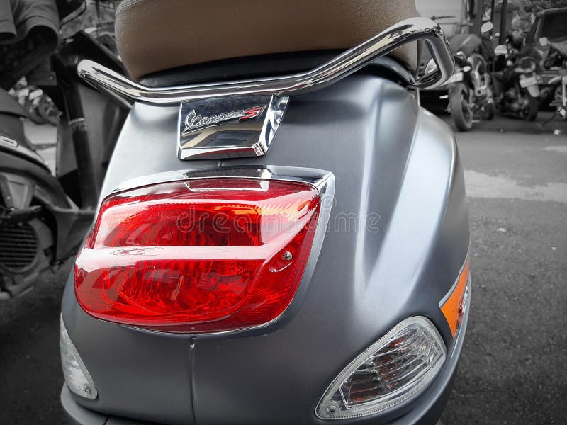 Vespa motorcycle rear editorial stock photo. Image of sedan - 221608853