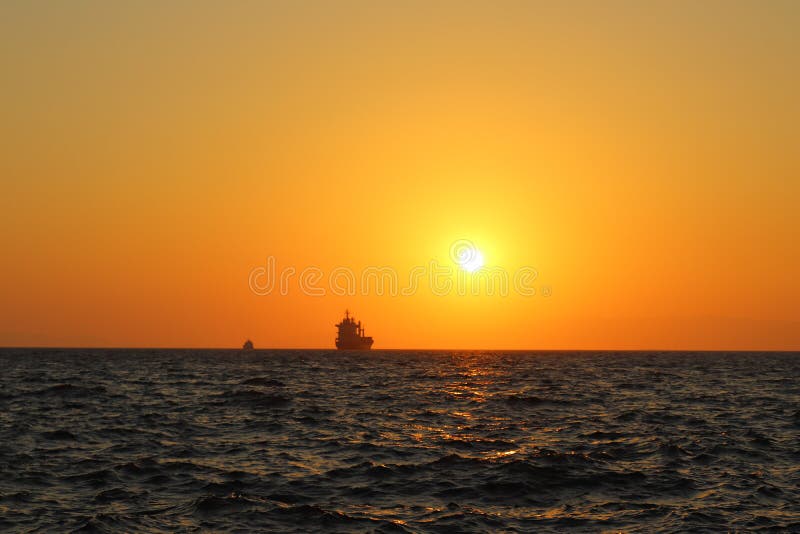 Vessel at Sunset stock image. Image of destination, ship - 217829983