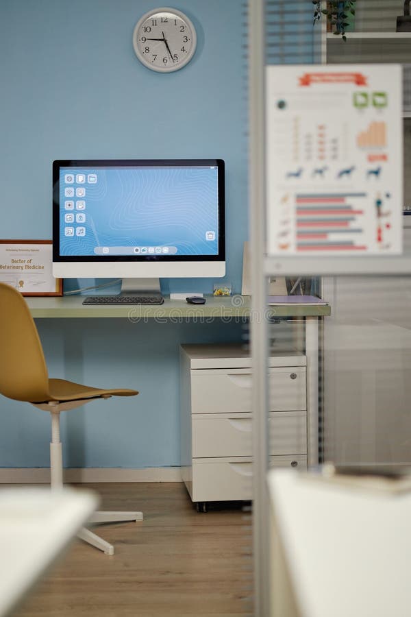 Veterinary Doctors Office with Blue Walls Equipped with Desktop ...