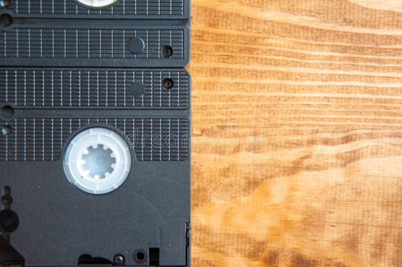 VHS Cassettes on a Wooden Table Stock Photo - Image of tape, technology ...