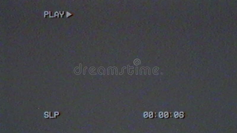 An Old Bad VHS Tape Playing. Old Black Screen with PLAY Text and ...