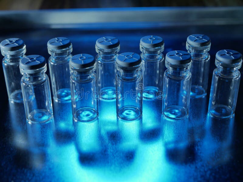 Vials in blue light stock image. Image of medication - 214545555