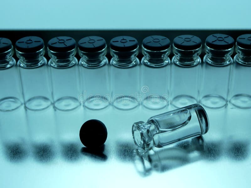 Nine Filled Vials with Another an Open One in the Front Stock Photo ...