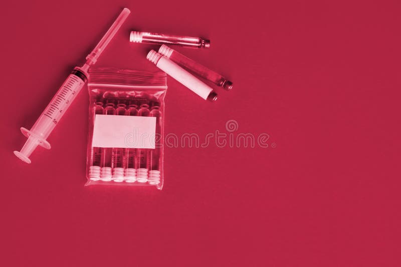 Vials with a Cure for the Disease, 3 Ml, a Plastic Syringe with a ...