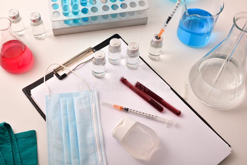 Vials with Syringe on Laboratory Bench Chemical Glassware Stock Photo ...