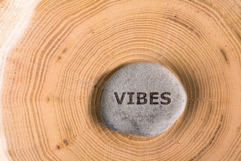 Vibes in stone on tree stock image. Image of good, material - 118009993