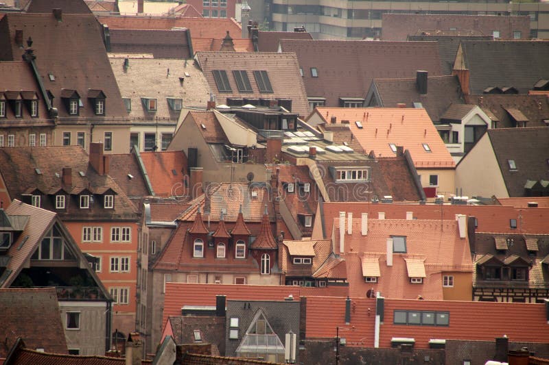 Many Different Colored Rooftops with Many Building Styles in the ...