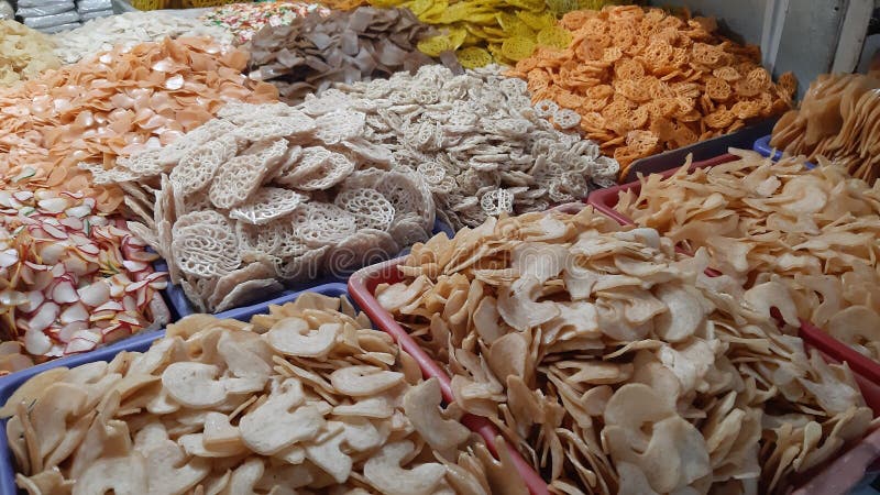 A Vibrant Array of Colorful Crackers and Chips, Including Papad, are ...
