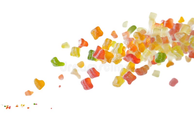 Vibrant Assortment of Gummy Candies Falling Against a White Backdrop ...