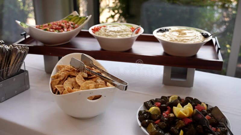 A Vibrant Assortment of Mediterranean Dishes, Including Dips, Stuffed ...