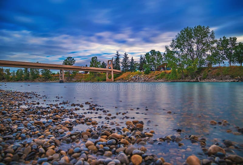 Vibrant Blue Clouds Over the Bow River in the Summer Stock Image ...