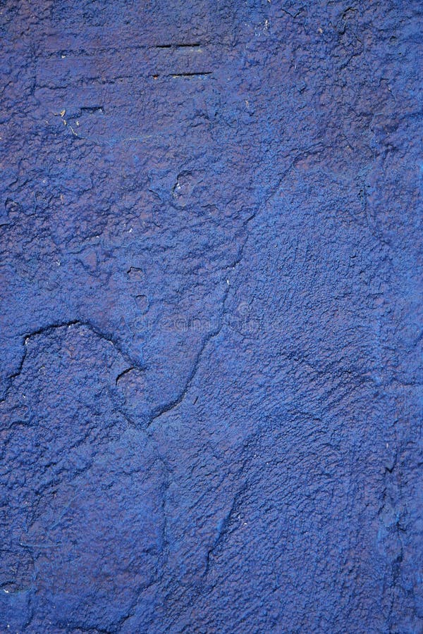A Vibrant Blue Textured Wall Background Radiating Energy and Creativity ...