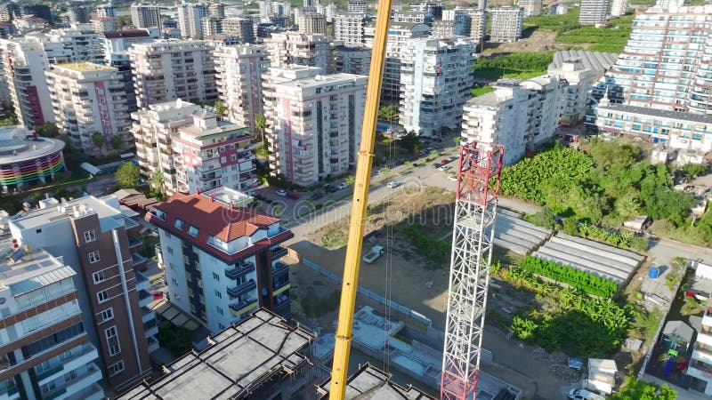 Aerial View: Skilled Operator Navigates Ladders and Assembles Parts of ...