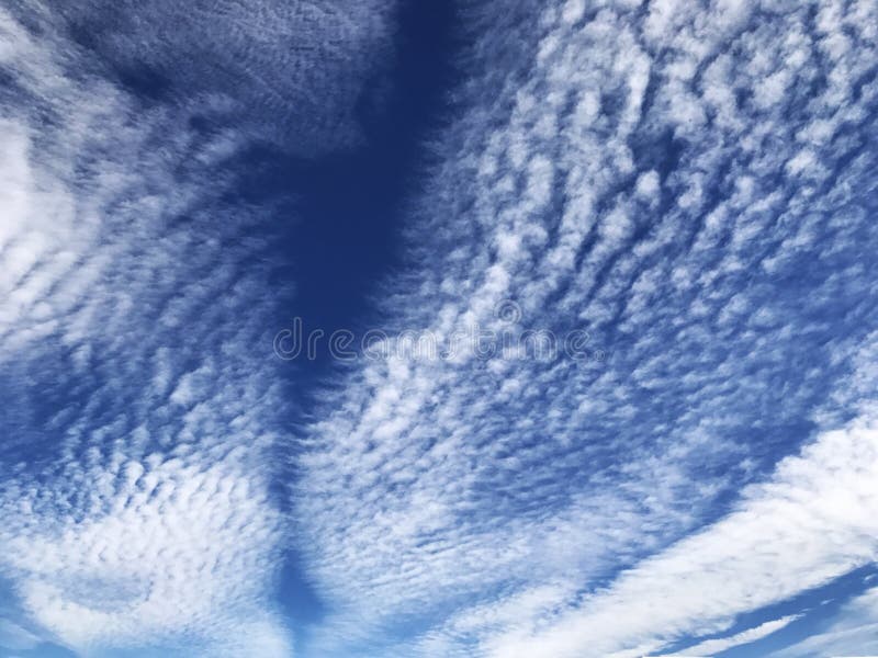 Vibrant Clouds Sweeping through the Sky Stock Photo - Image of vibrant ...