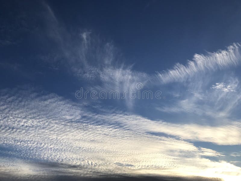 Vibrant Clouds Sweeping through the Sky Stock Photo - Image of ...