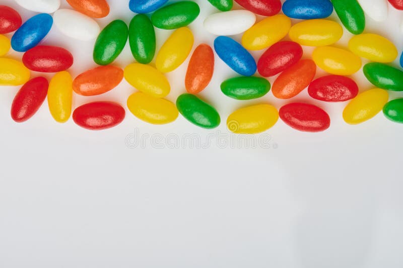 Vibrant color oval candy stock photo. Image of shape - 186385560
