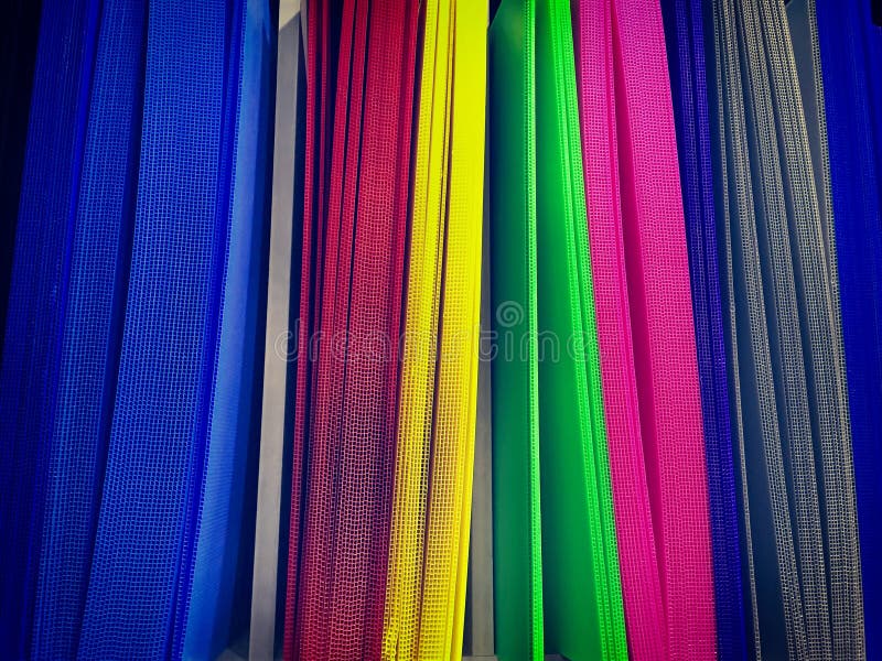 Vibrant Corrugated Plastic Sheets on Shelf Stock Photo - Image of plate ...